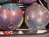 Center of Gravity placement on a symmetrical bowling ball: How critical ...